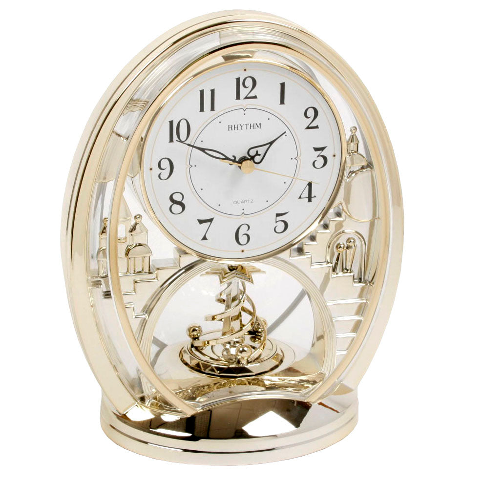 Rhythm Continental Oval Gilt Rotating Pendulum Mantel Clock – Plum Retail